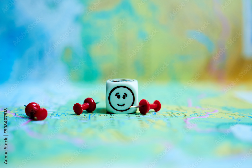 Map of the world with a cube and buttons. Concept - travel, summer ...