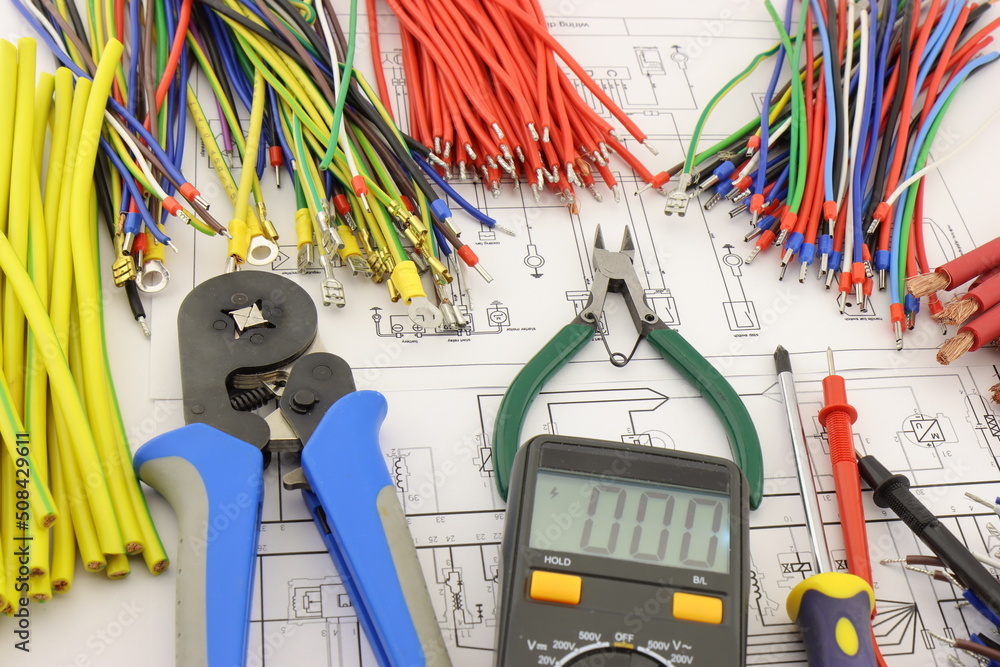 Multimeter and tools for installing an electrical control panel in ...