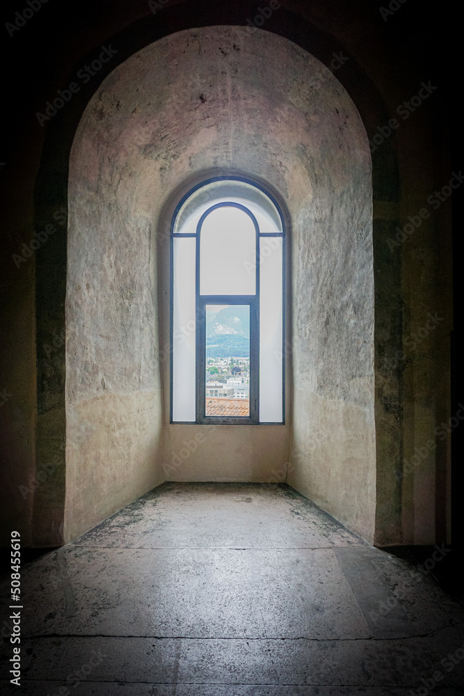 Large antique window in an 18th century castle that shows a beautiful ...