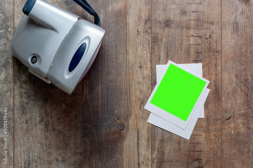 Snapshot of the nineties. An old camera and a place to insert any photo ...