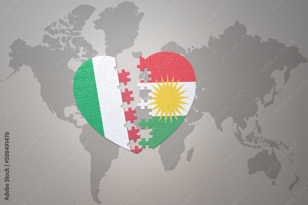 puzzle heart with the national flag of kurdistan and italy on a world ...