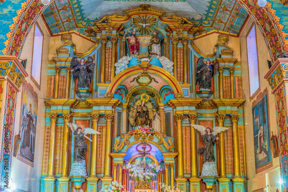 The interior of an old Spanish colonial church in Cuenca, Ecuador ...