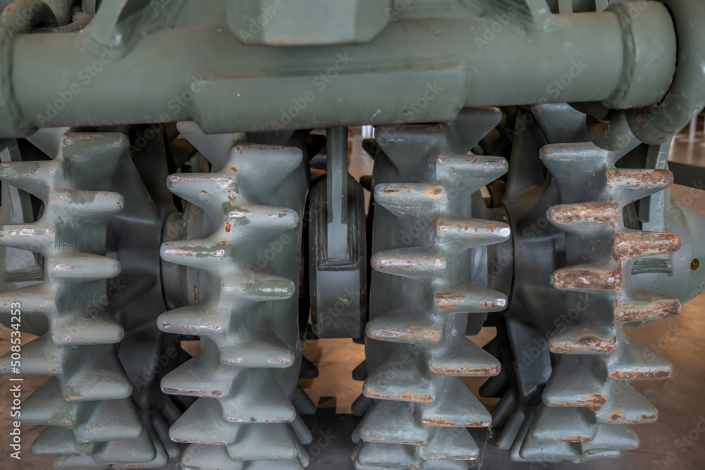 Large toothed mine rollers for detonating land mines mounted to the ...