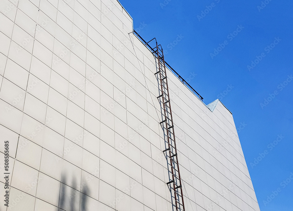 Outdoor fire escape on the wall of an office or industrial building ...