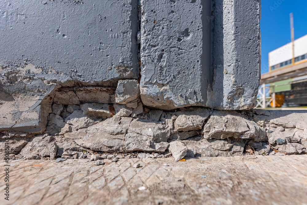 Crack in foundation building wall of home with cracked defects. Concept ...