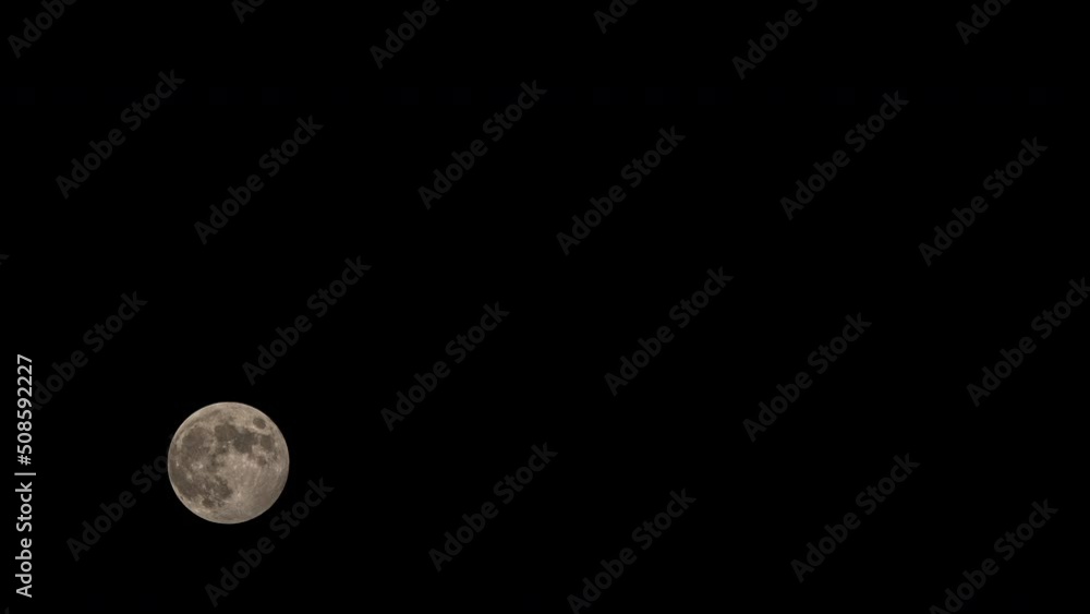 8K cinematic images. A timelapse image of the full moon, which is the ...