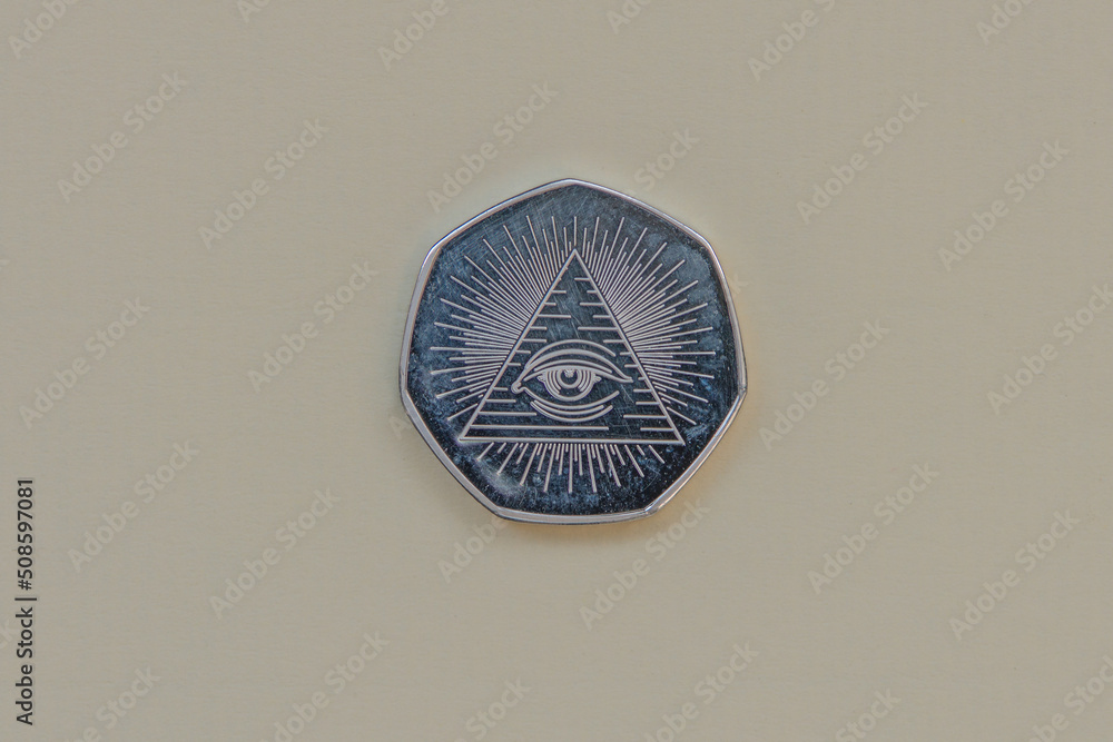Collectable Masonic coin showing the All seeing eye and Pyramid. Stock ...