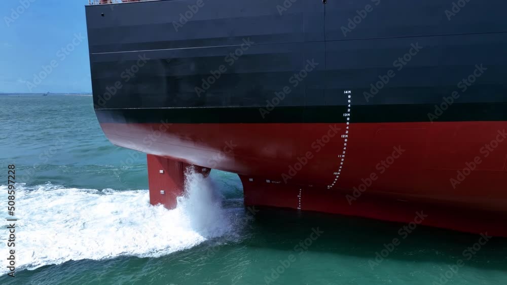 Propeller of large ship underwater spinning power working and water ...