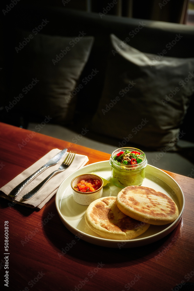 Roti Parata or Roti canai served with curry and sambal. Traditional ...