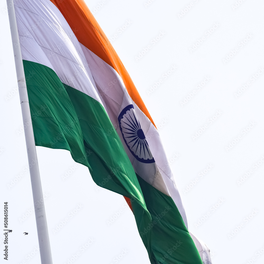 India flag flying high at Connaught Place with pride in blue sky, India ...