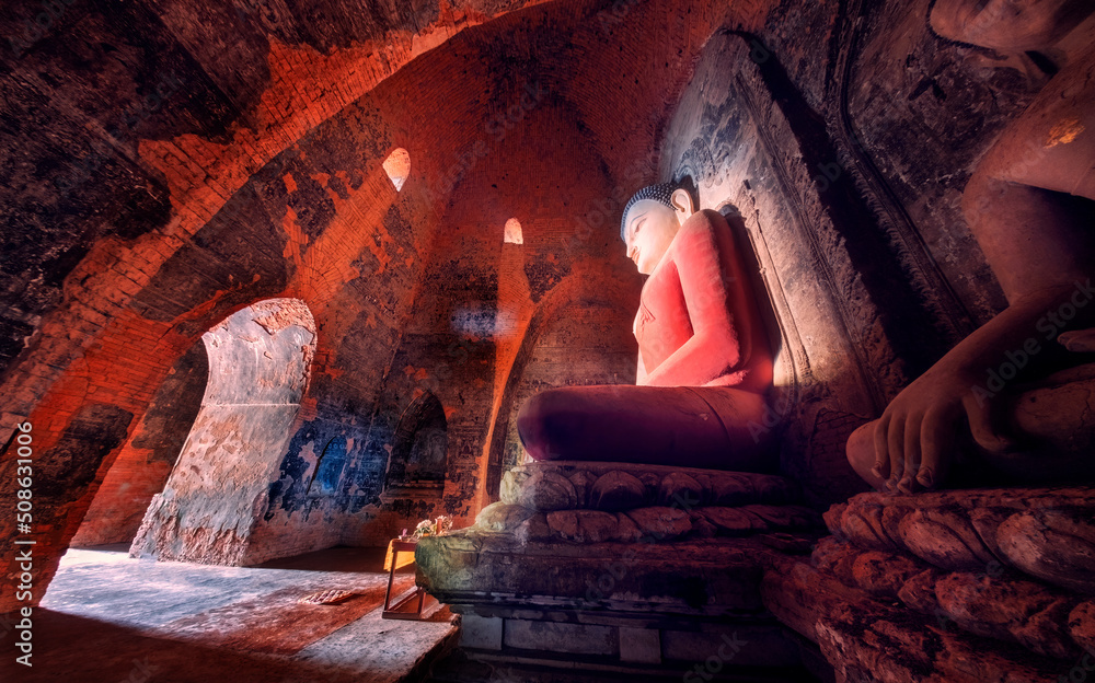 Ancient sitting Bagan Buddha in traditional Bagan style. Bagan is the ...