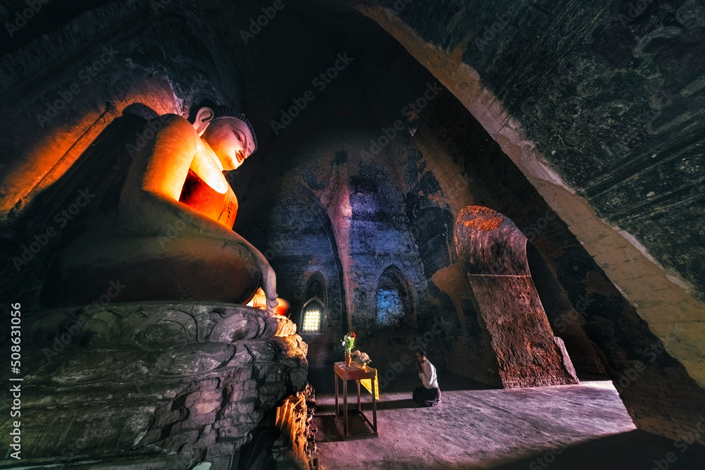 Ancient sitting Bagan Buddha in traditional Bagan style. Bagan is the ...