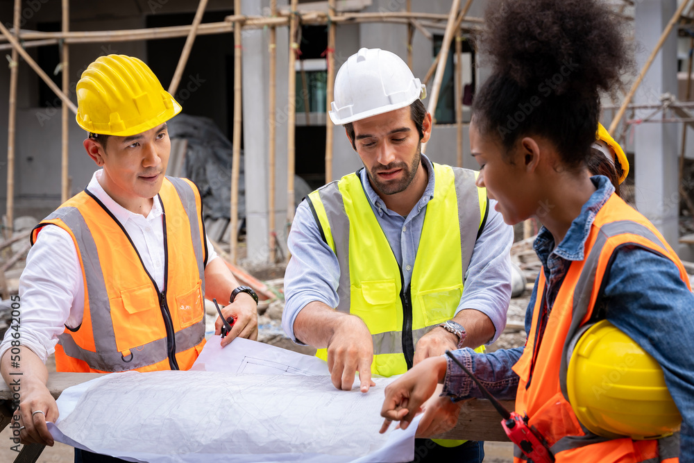 group civil engineers male female discuss inspect construction of ...