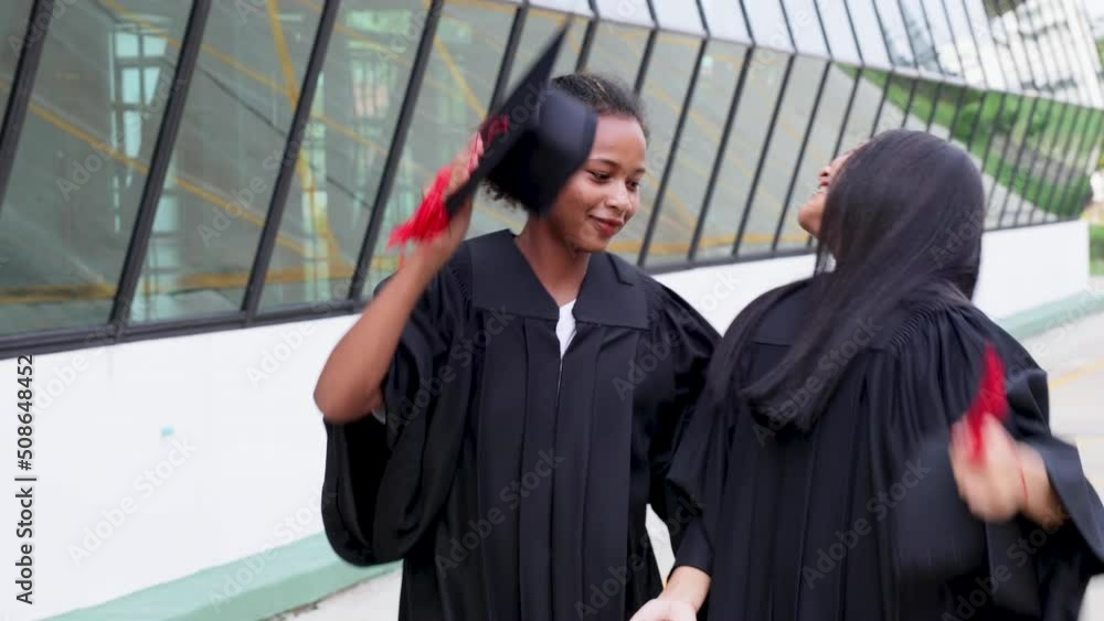 Dancing graduate woman student. Cheerful young beautiful teenage in ...