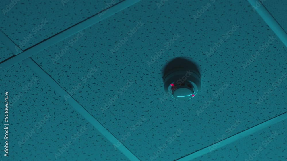 Fire Detection Sensor hangs on roof inside parking or office near ...