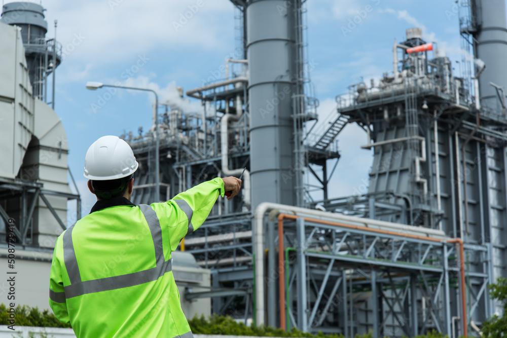 oil refinery factory. industrial engineer in Oil factory. Engineer ...