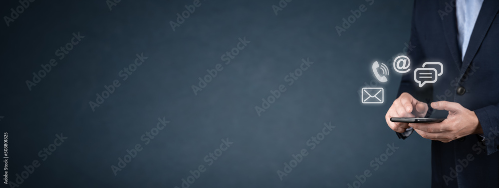 Contact Us, Hand of man holding mobile smartphone with mail, phone ...