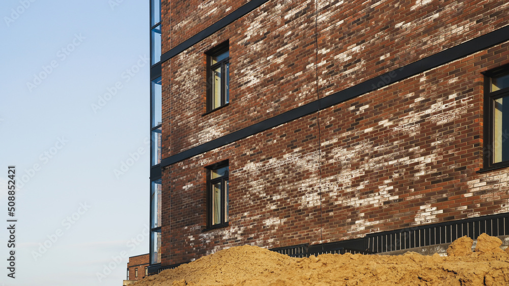 A new brick house stained with white efflorescence, a crystalline of ...