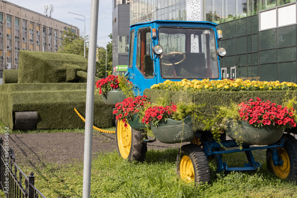 War of Russia against Ukraine. Ukrainian tractor dragging a captured ...