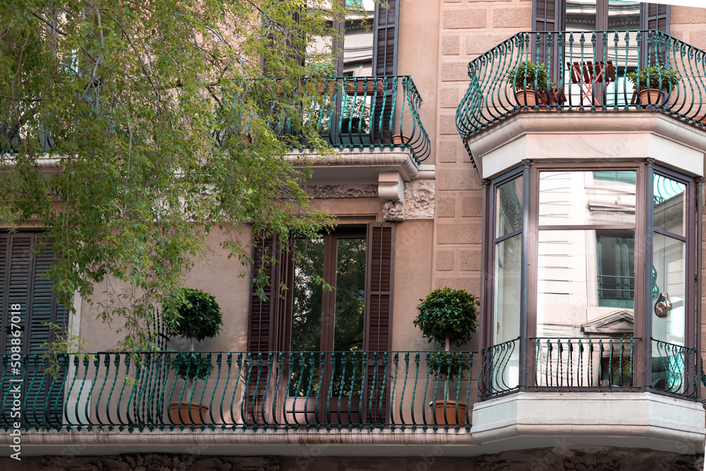 Classic apartment building with balconies and shutters in Barcelona ...