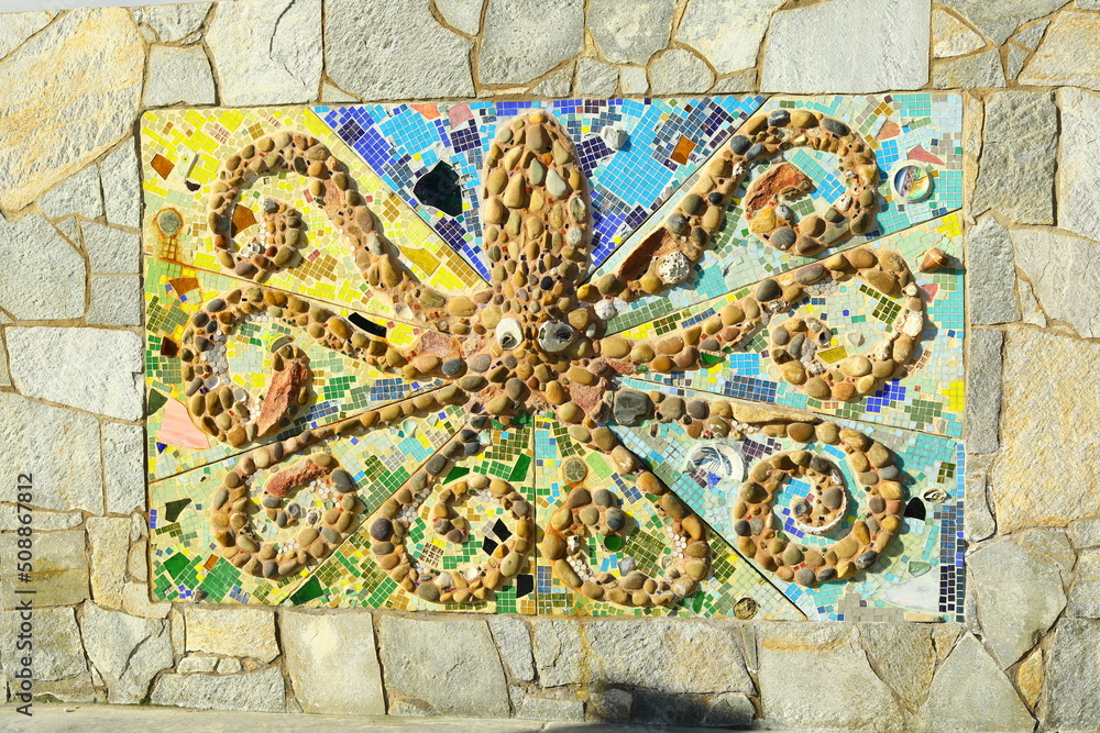 Big octopus squid made on the wall from shells in California st Diego ...