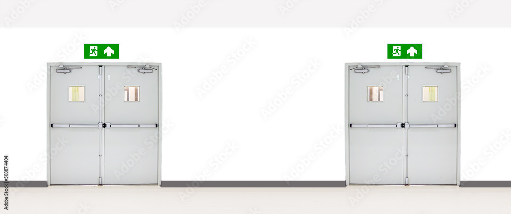 Green emergency fire exit sign or fire escape with the doorway or door ...