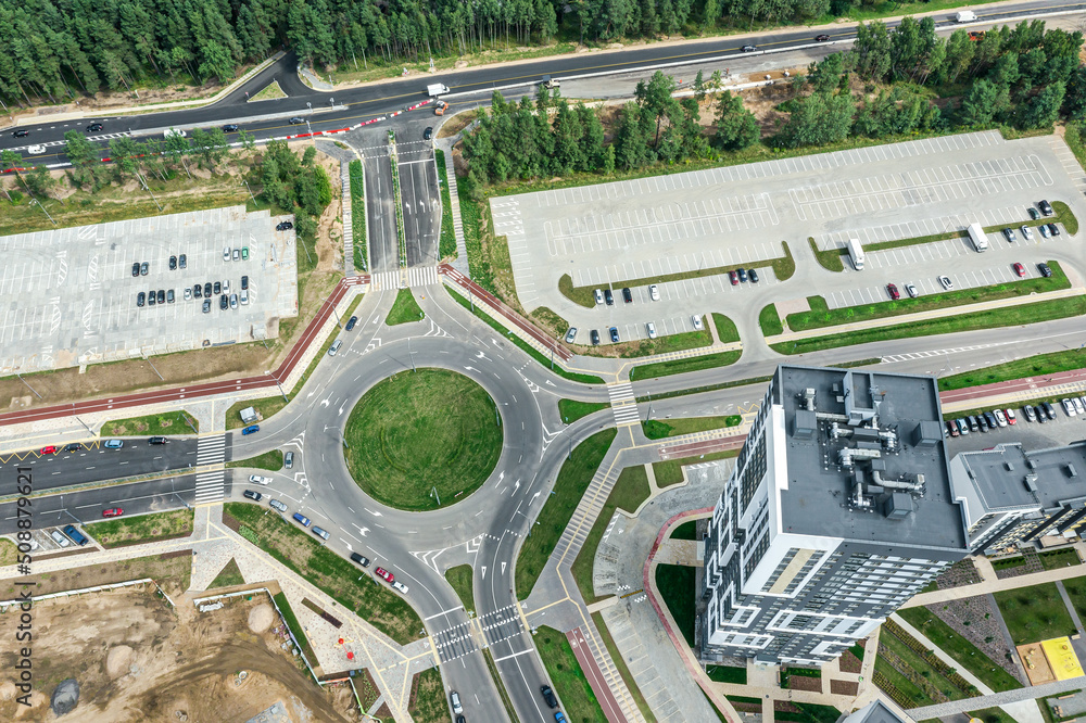 aerial view of roundabout and parking lots in suburb district at sunny summer day Stock Photo ...