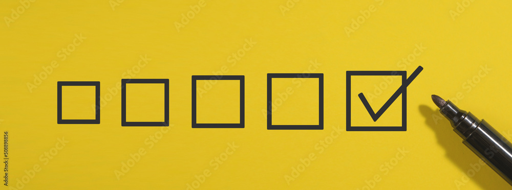 Marker with checkbox in checklist. Business Stock Photo | Adobe Stock