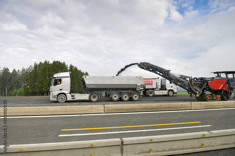 Road construction industry in Germany. Asphalt under construction or ...