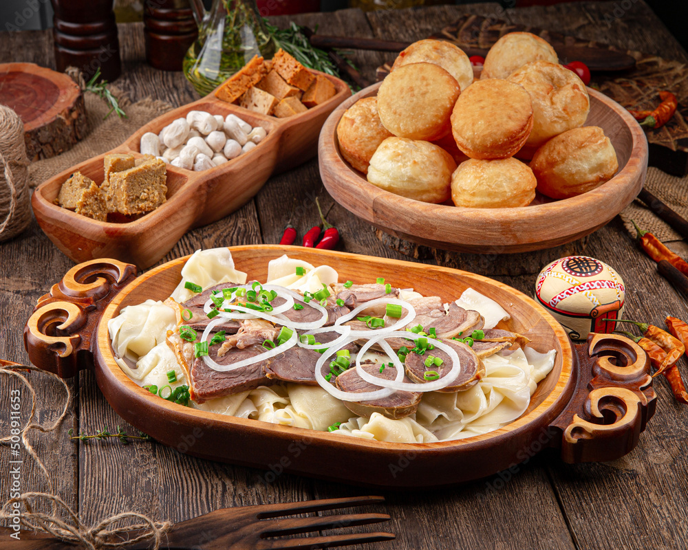 Kazakh national traditional cuisine dishes beshbarmak and baursaqs ...