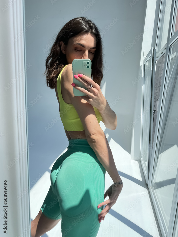 Fit Tanned Woman In Sportswear Fitting Blue Leggings Perfect Body Fit Tanned Woman In Sportswear Fitting Blue Leggings Perfect Body