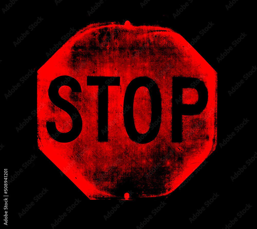 Red stop sign. A worn and damaged stop sign on a black background ...