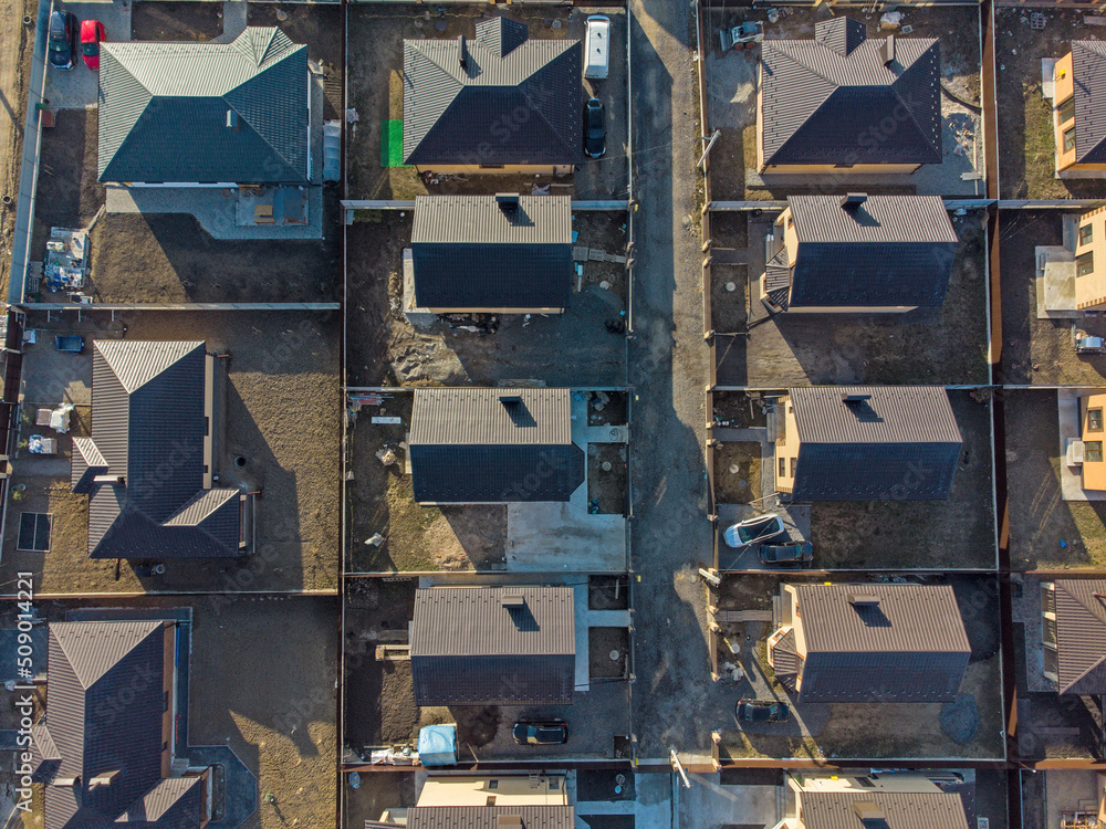 Urban scene across built up area showing the slate roof tops of houses ...