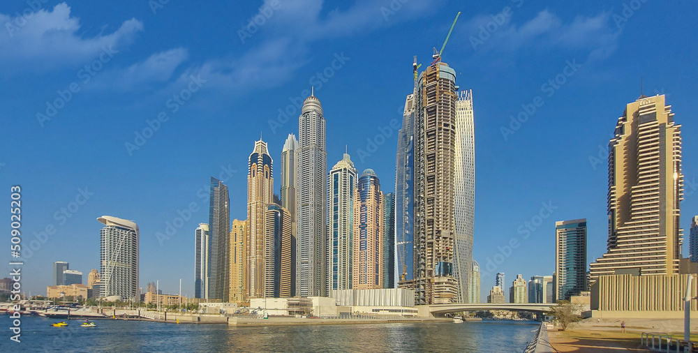 UAE. Dubai. Dubai Marina. View of the skyscrapers and the bridge over ...
