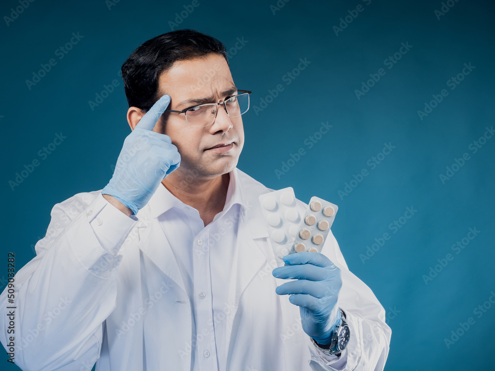 Doctor demonstrates pills. Man holds blisters with antibiotics. Concept ...