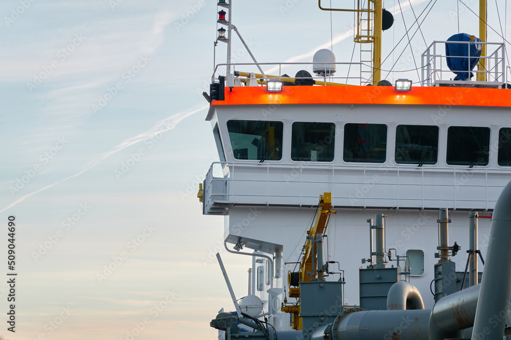 Photo & Art Print Trailing suction hopper dredger ship anchored in ...