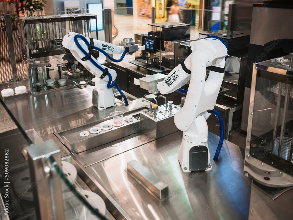 Foto de Robotic Barista making coffee automated Robot display for ...