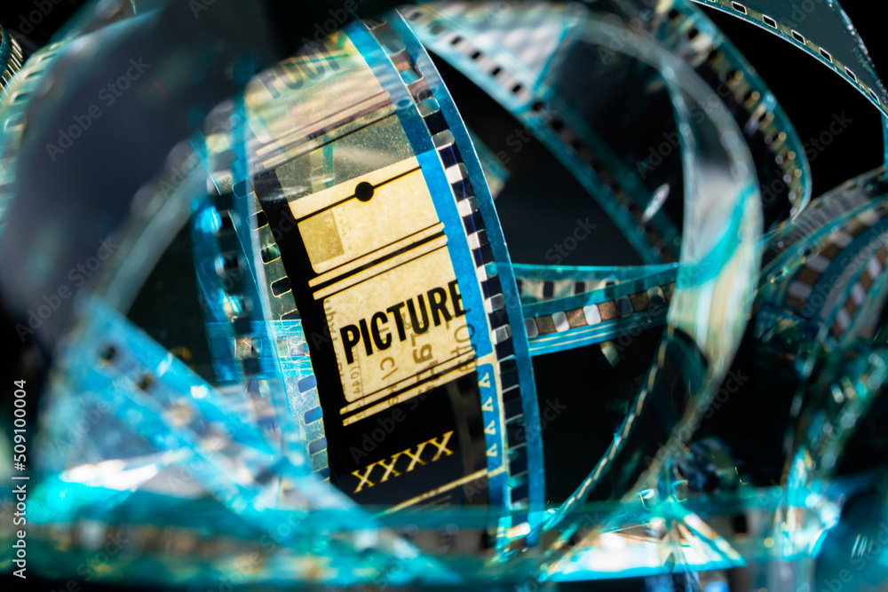 Camera negative film. Selective focus on swirling strips film ...