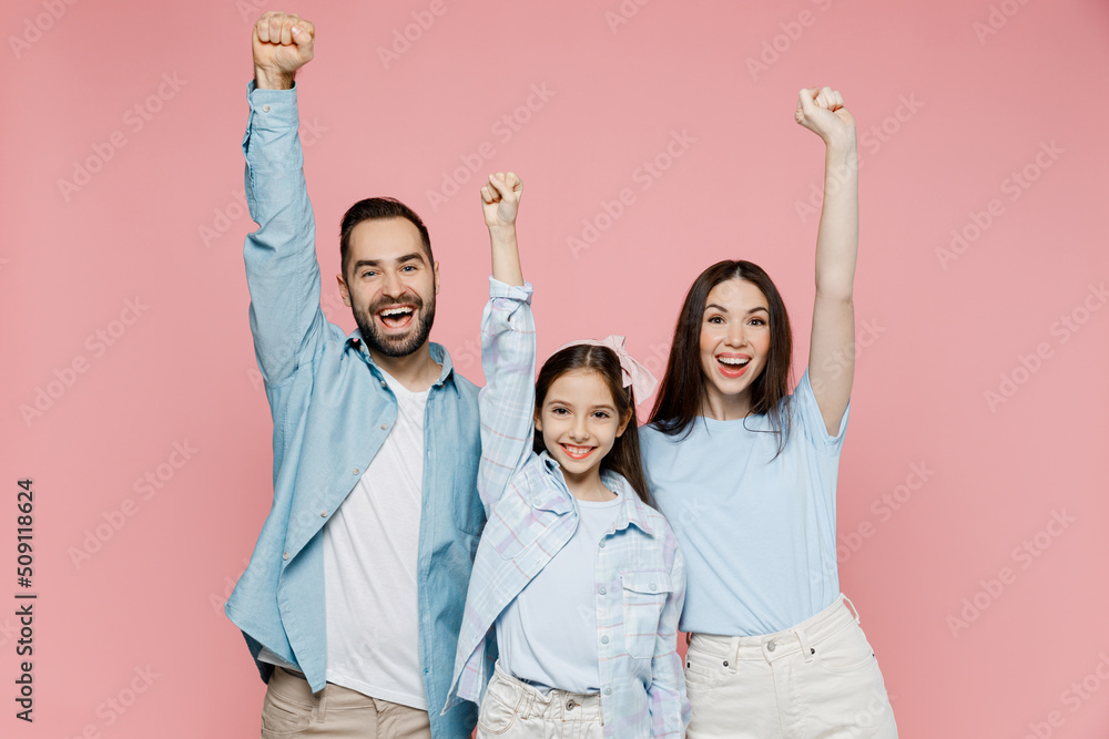 Young happy jubilant excited parents mom dad with child kid daughter ...