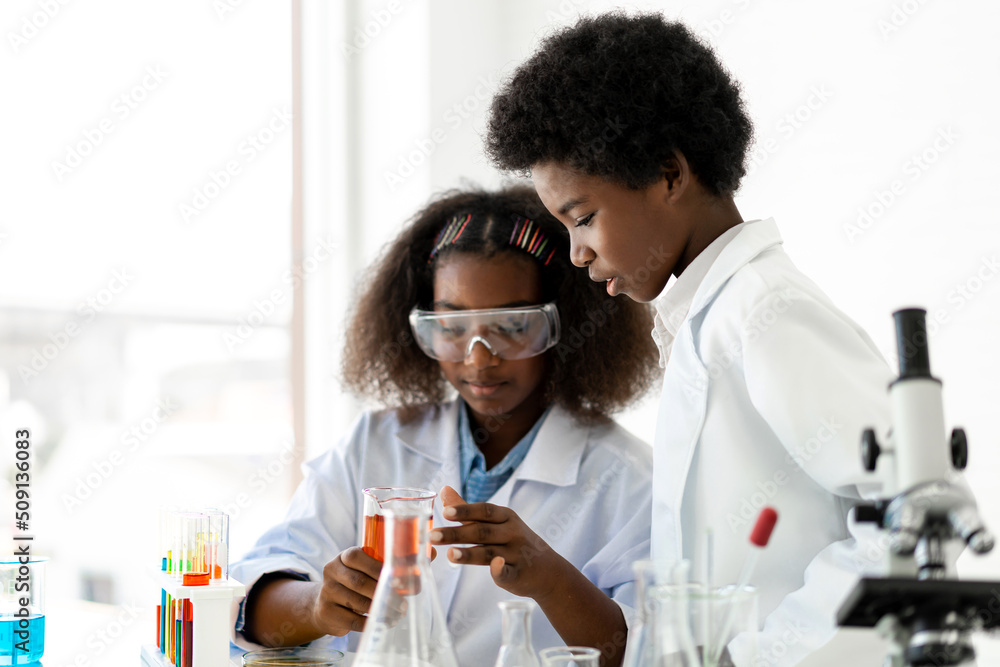 Foto Stock Two african american cute little boy and girl student child ...