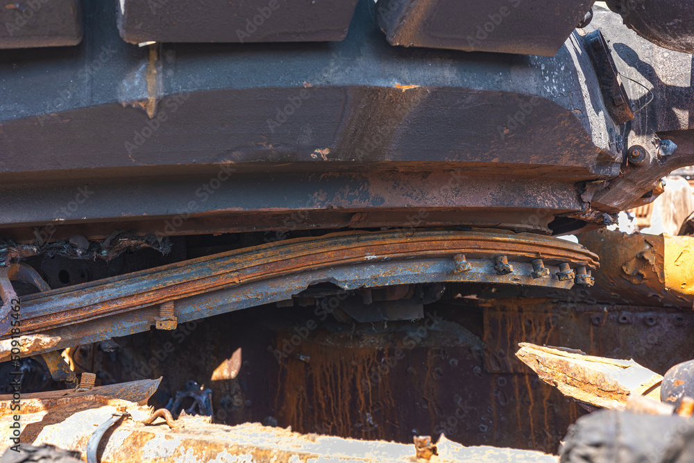 The war in Ukraine, the tank hull torn near the tower, the tank tower ...