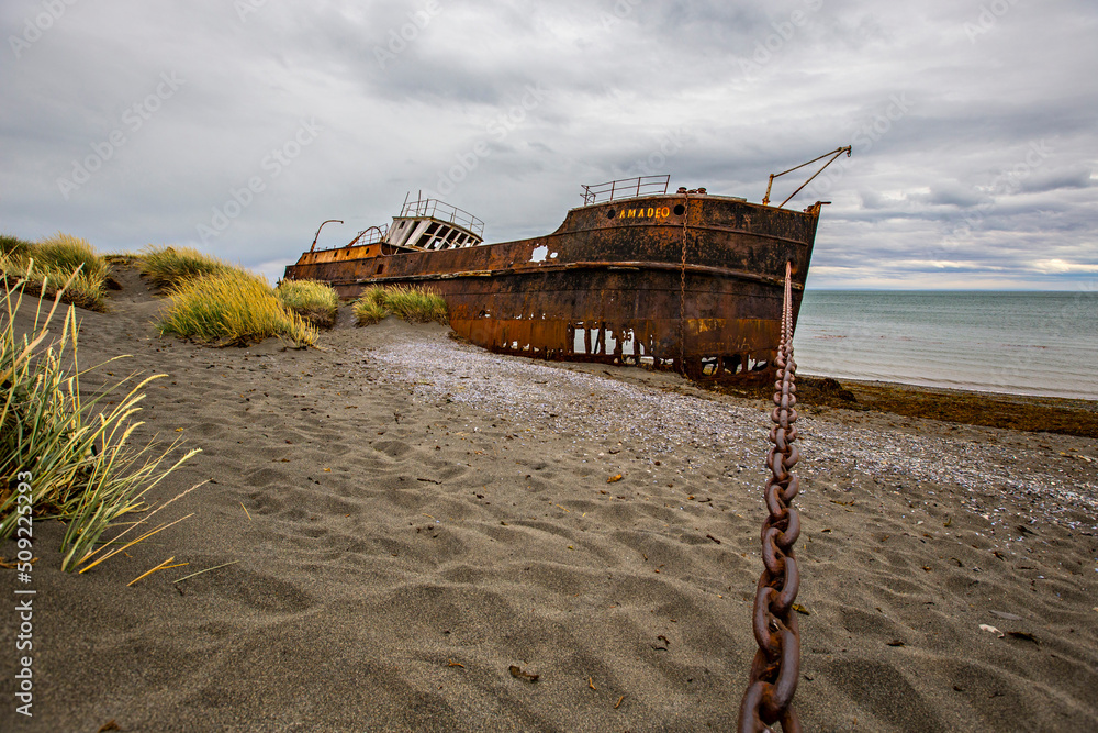 Shipwreck called Amadeo on the coast of Magellan Strait, rusty warship ...