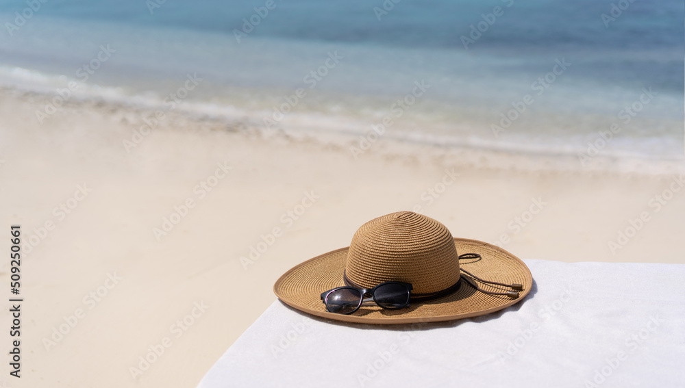 hat on the beach Stock Photo | Adobe Stock