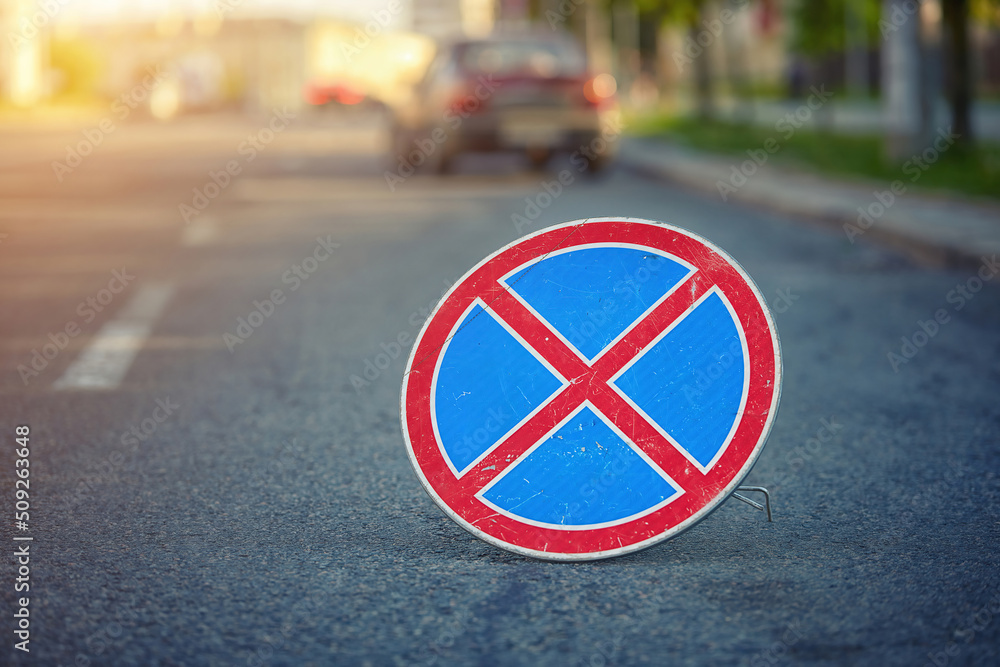 No parking road sign, road sign stands on asphalt road. No parking and ...