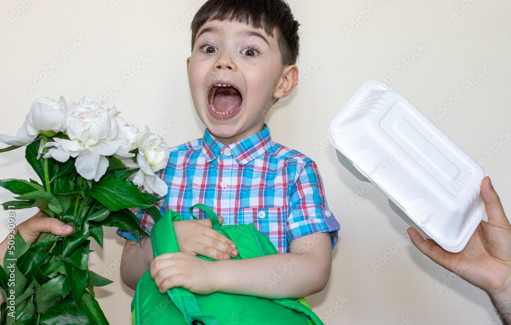 cute little boy staying in the middle and make funny face,mouth ...