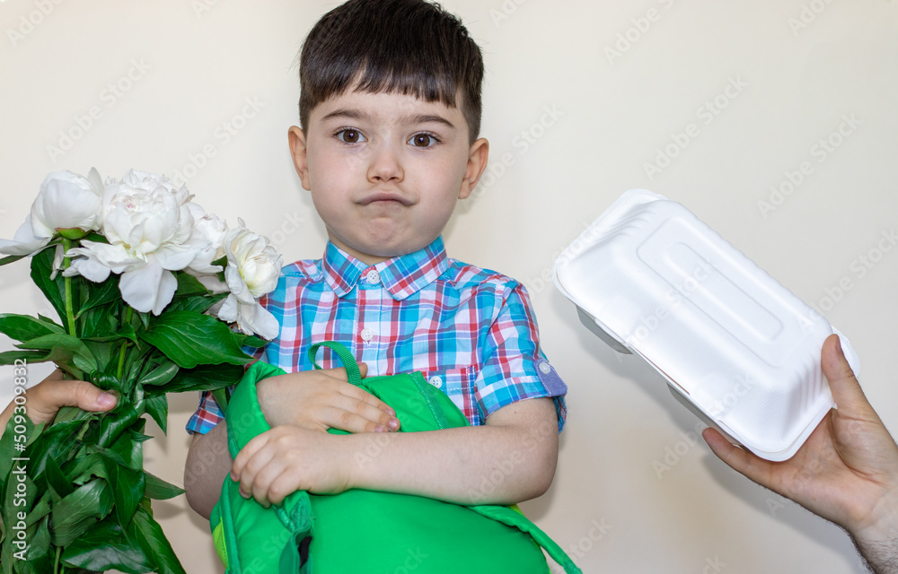 cute little boy staying in the middle and make funny face,mouth ...