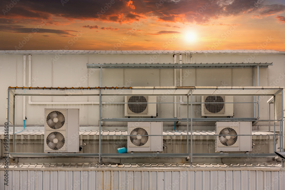 Air conditioner compressor installed in old building. Outdoor split ...