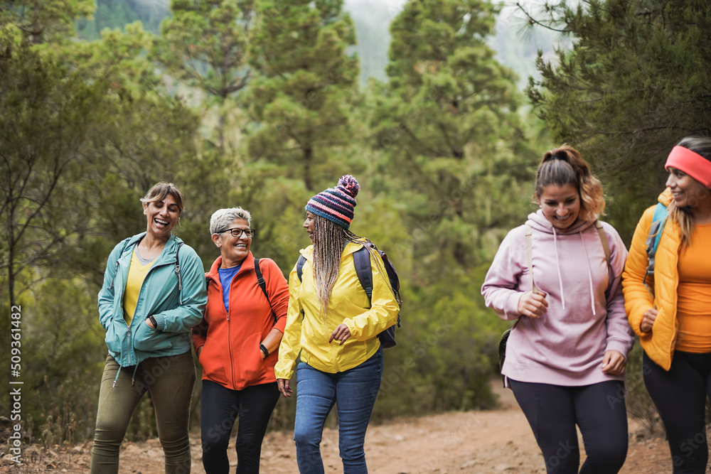 Multi generational women having fun during trekking day outdoor Stock ...