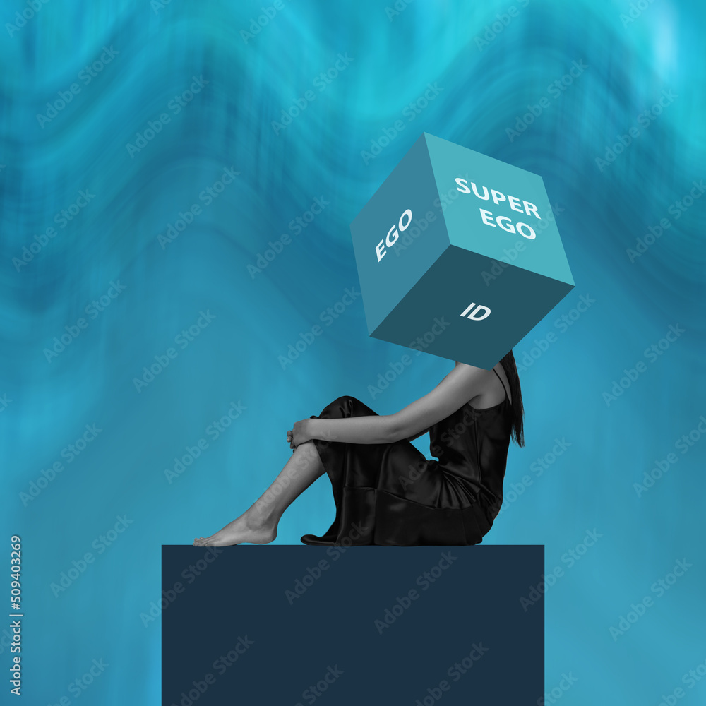 Seated woman with a cube in front of her head with the inscriptions Id ...