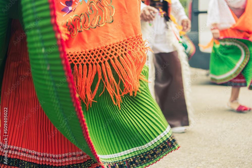 Ecuadorian indigenous men and women dressed in their typical costumes ...